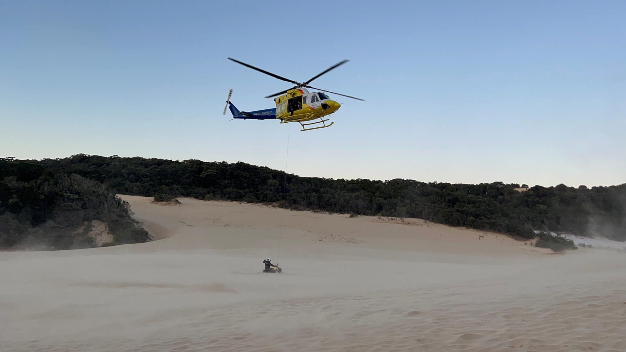 RACQ LifeFlight Rescue winches man from island - LifeFlight
